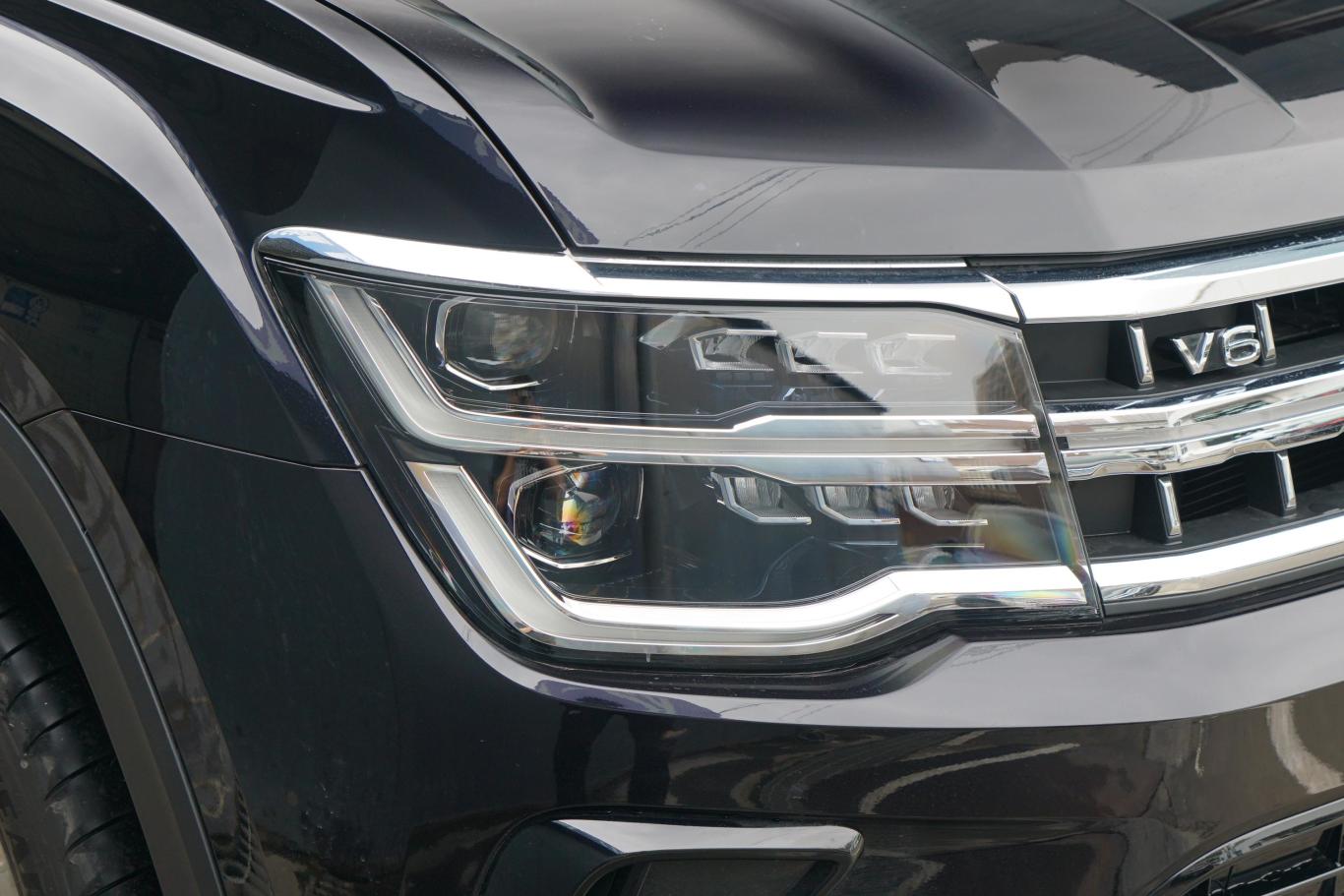 【途昂530 V6 四驱尊崇旗舰版大灯侧45度俯拍图片-汽车图片大全】-易车