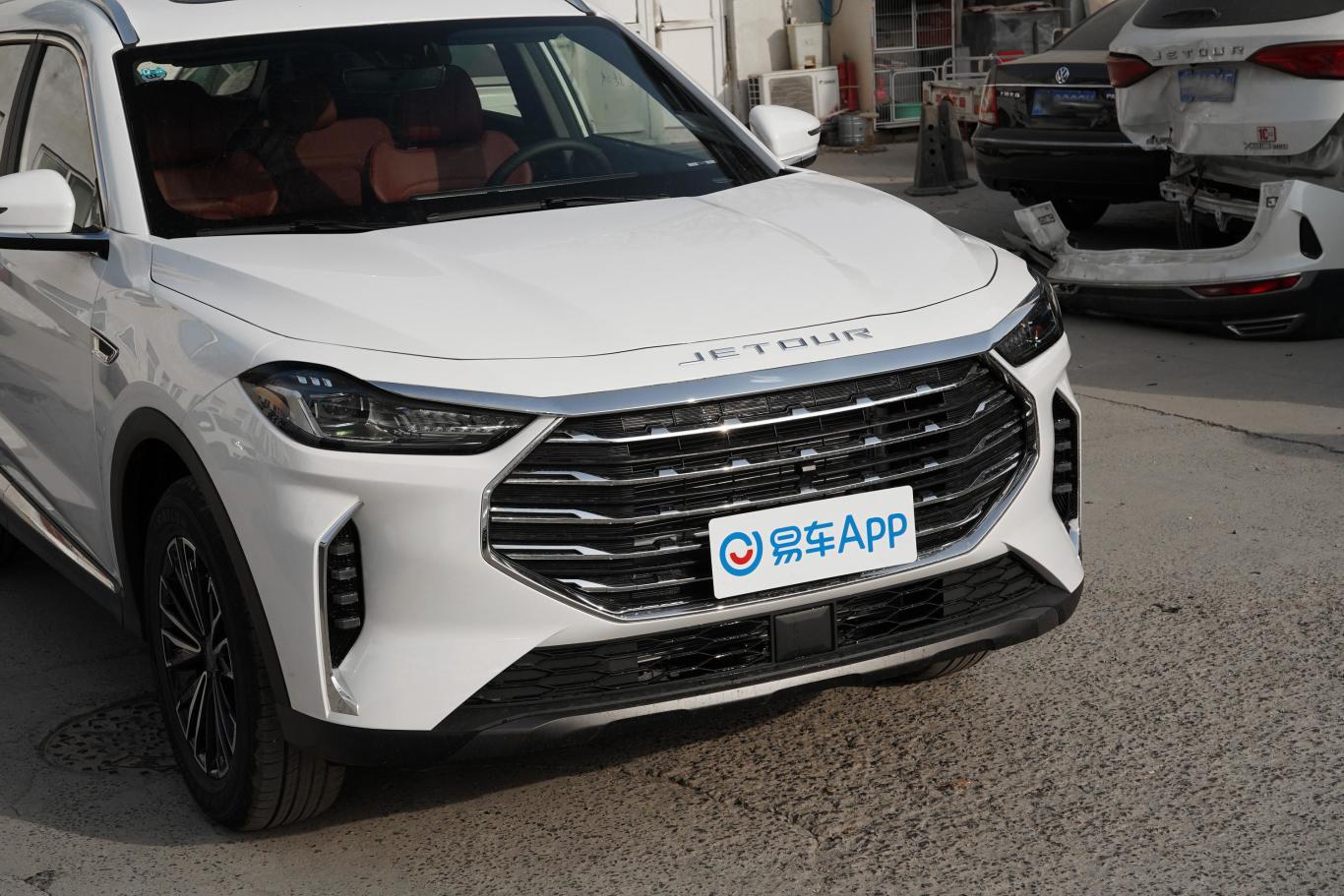 【捷途X70 PLUS1.5T 手动自强 7座前格栅侧俯拍图片-汽车图片大全】-易车