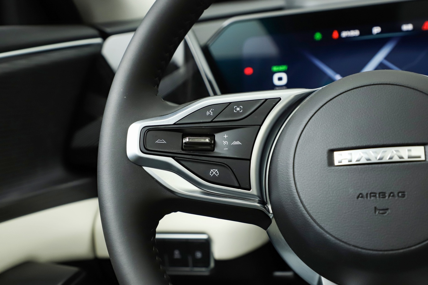 【哈弗枭龙MAX1.5L 105km 四驱智能旗舰版左侧方向盘功能按键图片-汽车图片大全】-易车