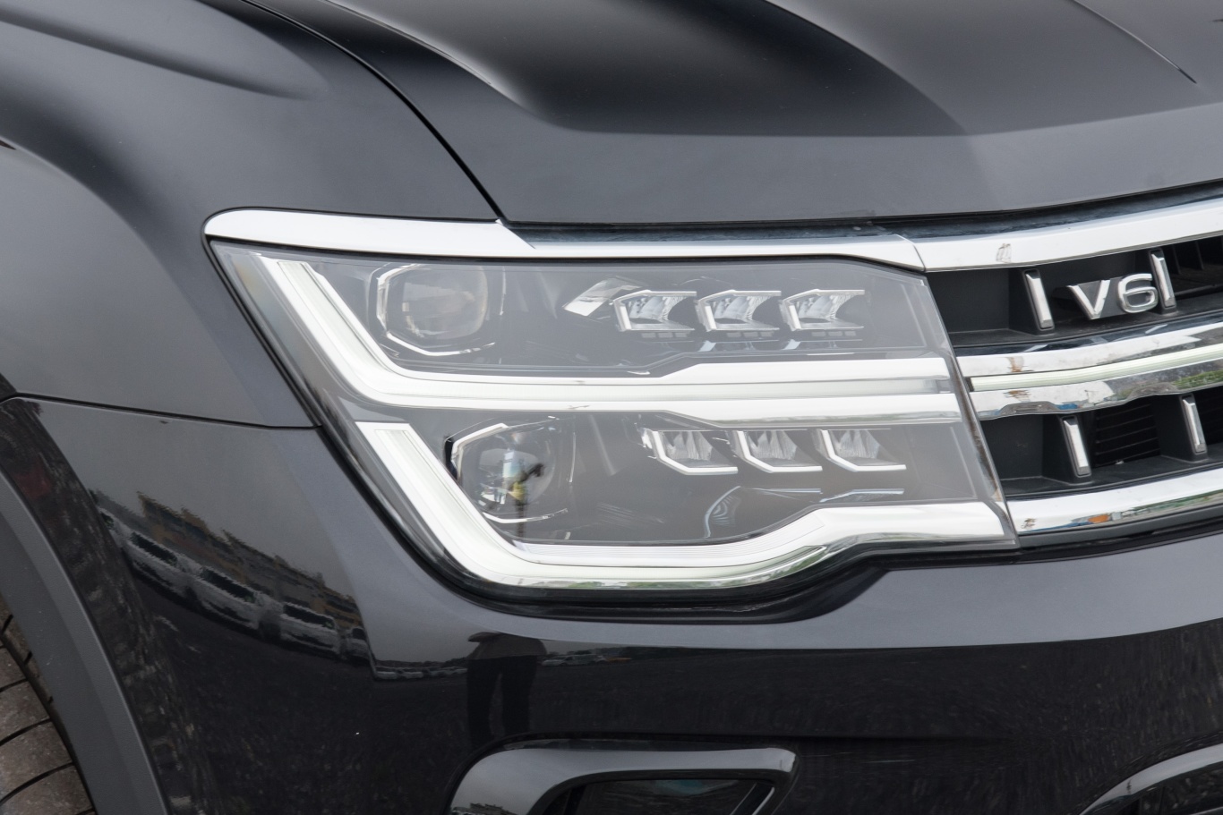 【途昂出众款 530 V6 四驱龙祥版大灯侧45度俯拍图片-汽车图片大全】-易车